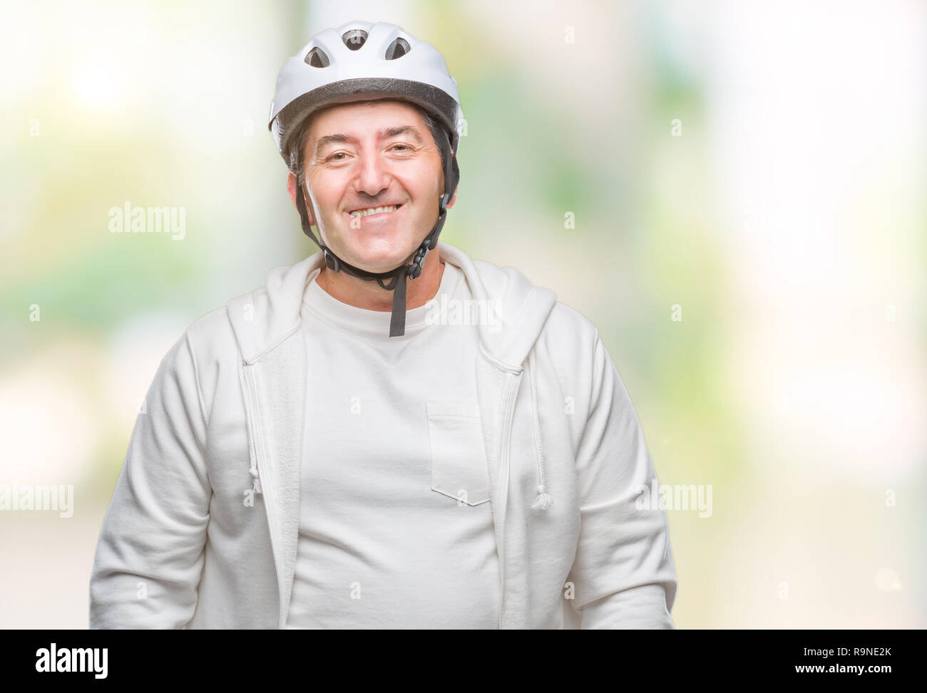 Handsome Senior Cyclist Man Wearing Bike Helmet Over Isolated