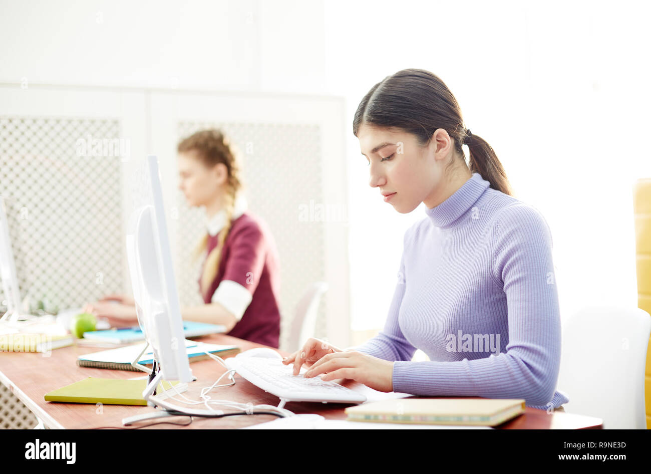 Teenager at computer back hi-res stock photography and images - Alamy