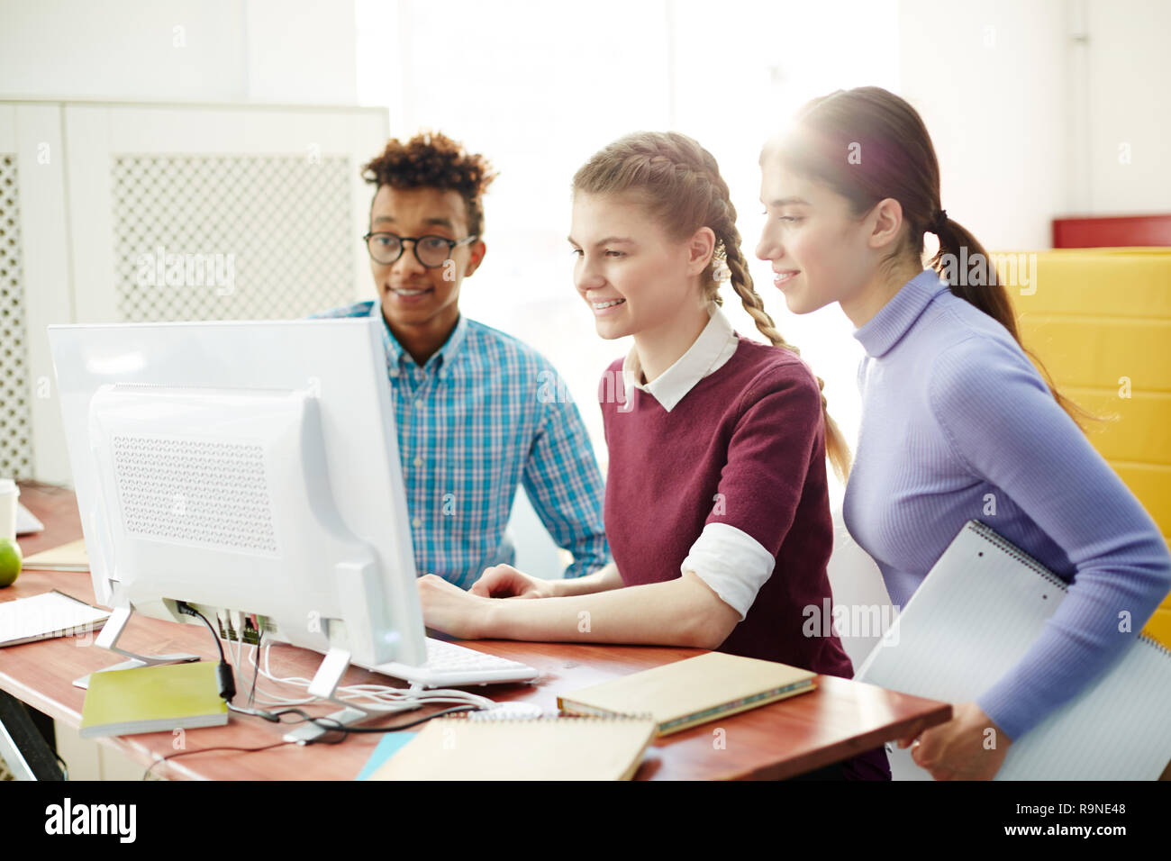 Learning in classroom Stock Photo - Alamy