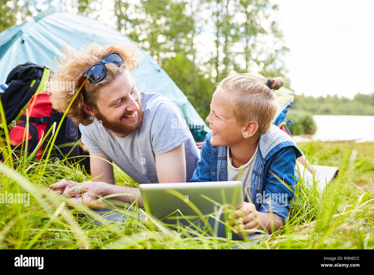 Scouts with gadget Stock Photo - Alamy