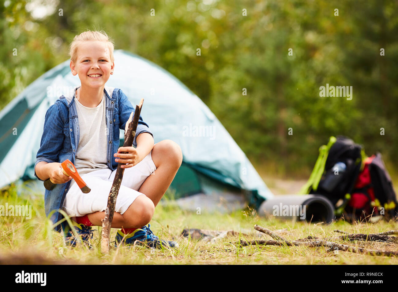Boy camping scout hi-res stock photography and images - Alamy
