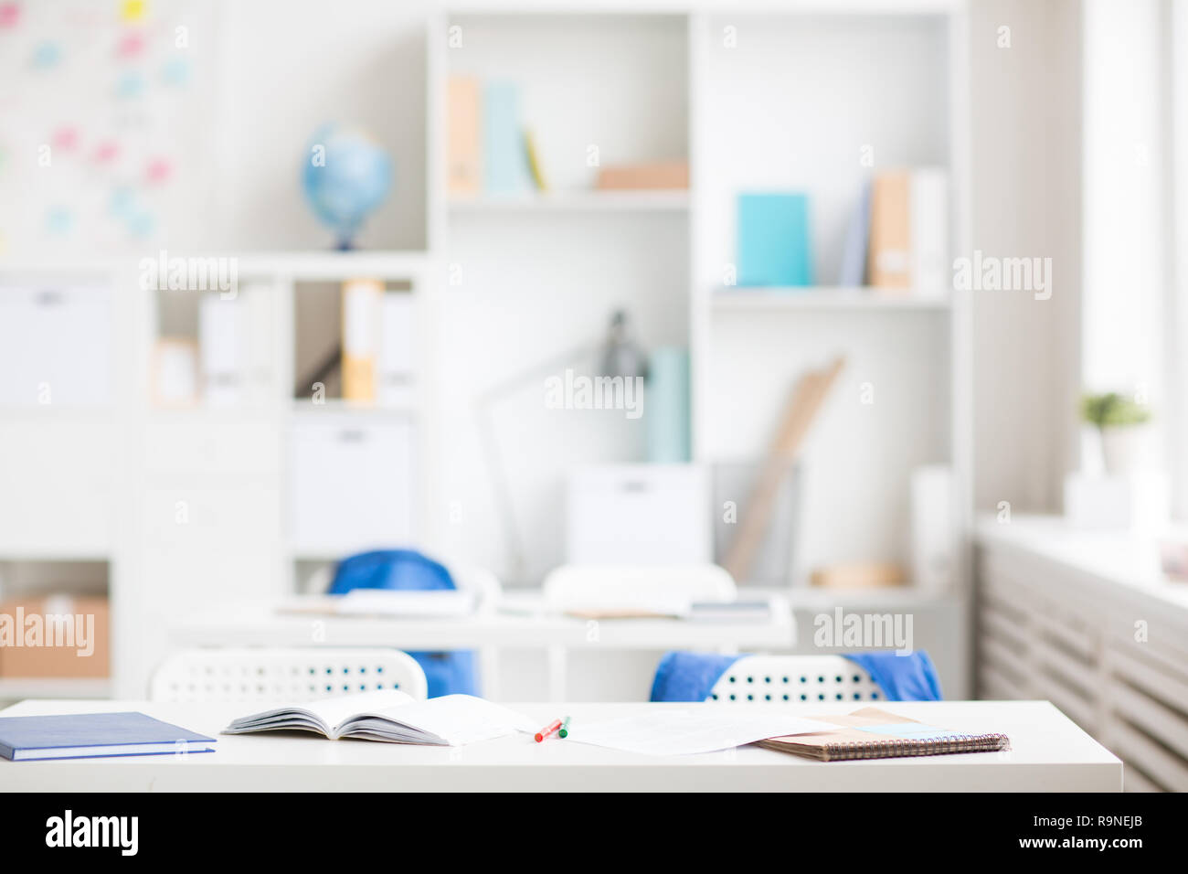 Workplace in classroom Stock Photo - Alamy