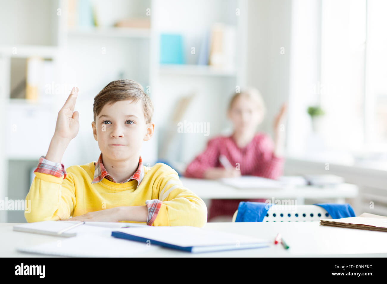 Boy working at lesson Stock Photo - Alamy