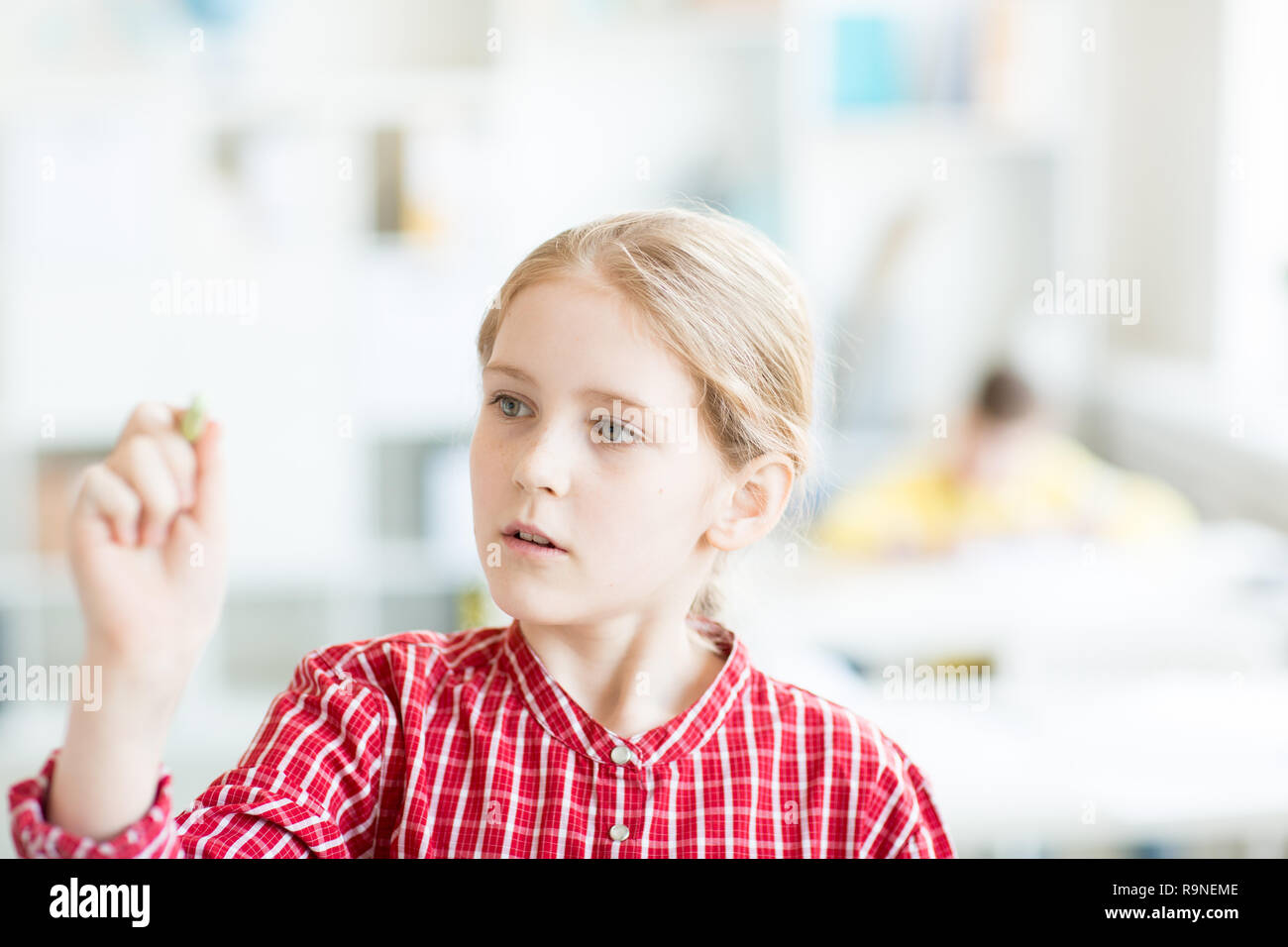 School child writing pensive hi-res stock photography and images - Alamy