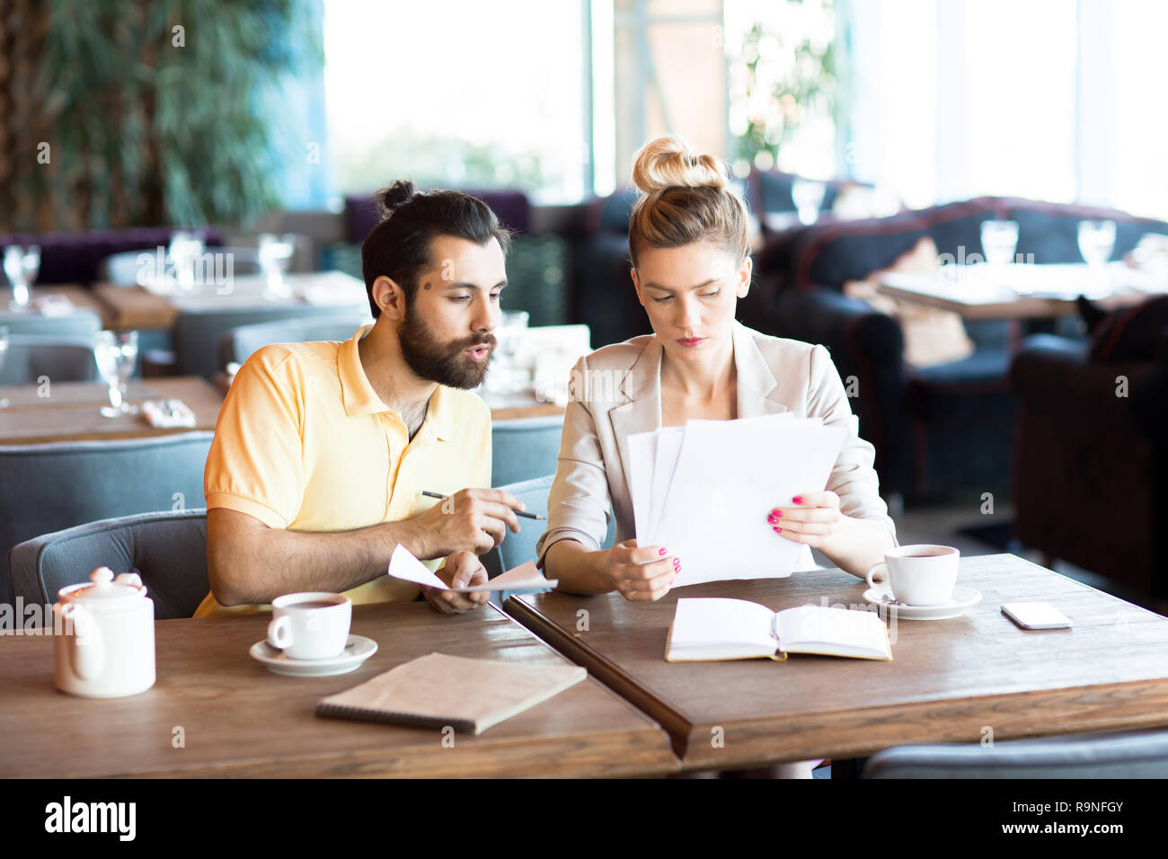 Working with documents Stock Photo - Alamy