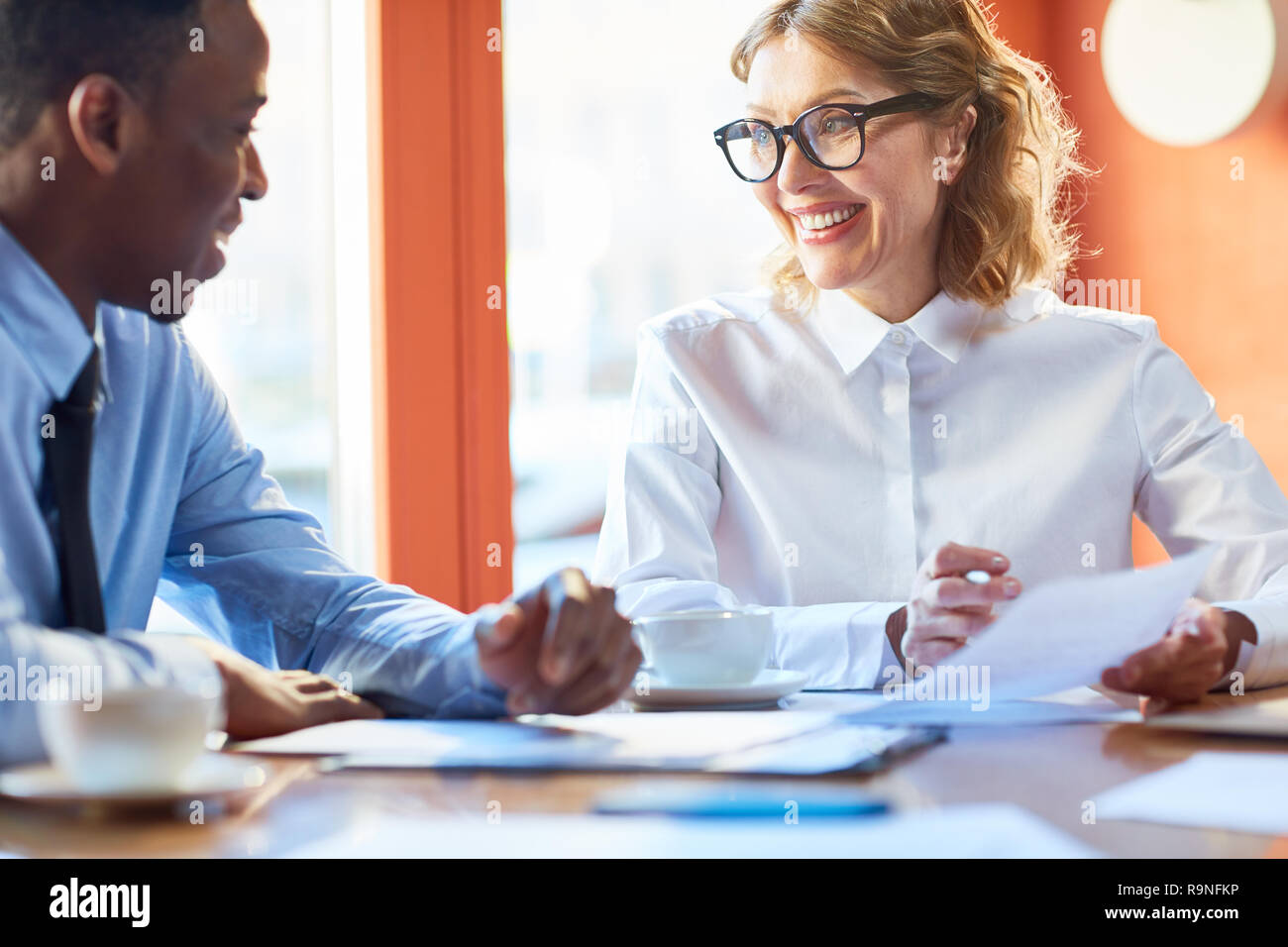 Young mature business partners hi-res stock photography and images - Alamy