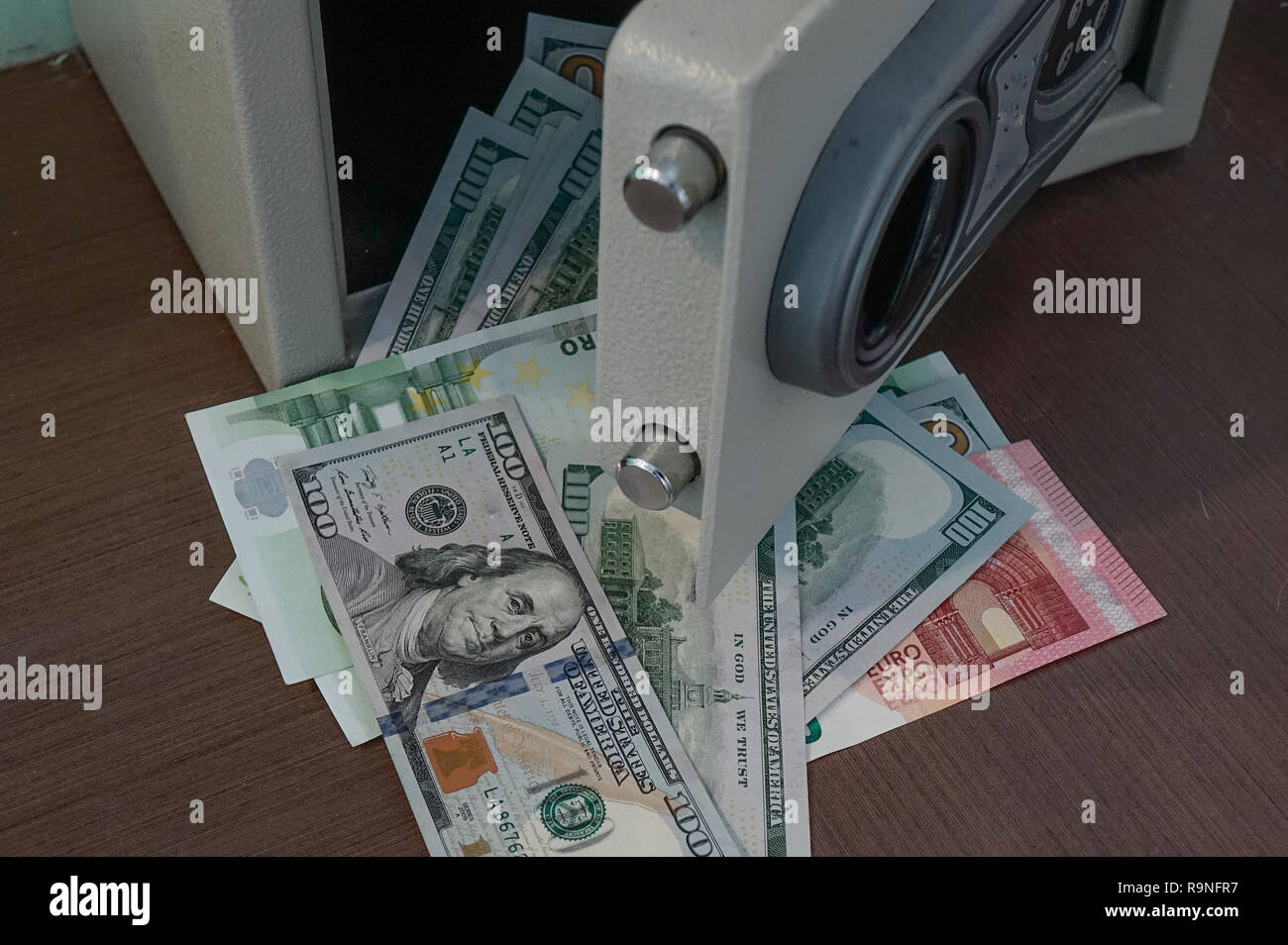 American Dollar and Euro banknotes in the unlock safe deposit box Stock ...