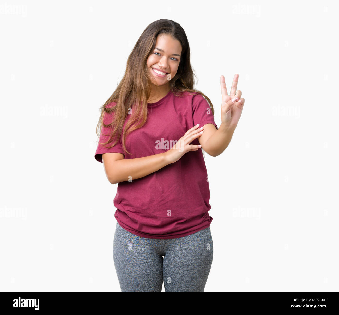 Hispanic beautiful woman winking face hi-res stock photography and ...