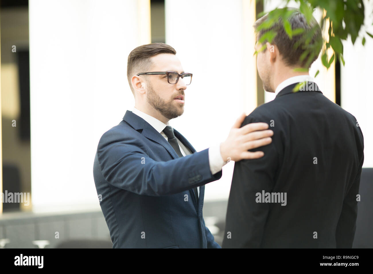 Comforting colleague hi-res stock photography and images - Alamy