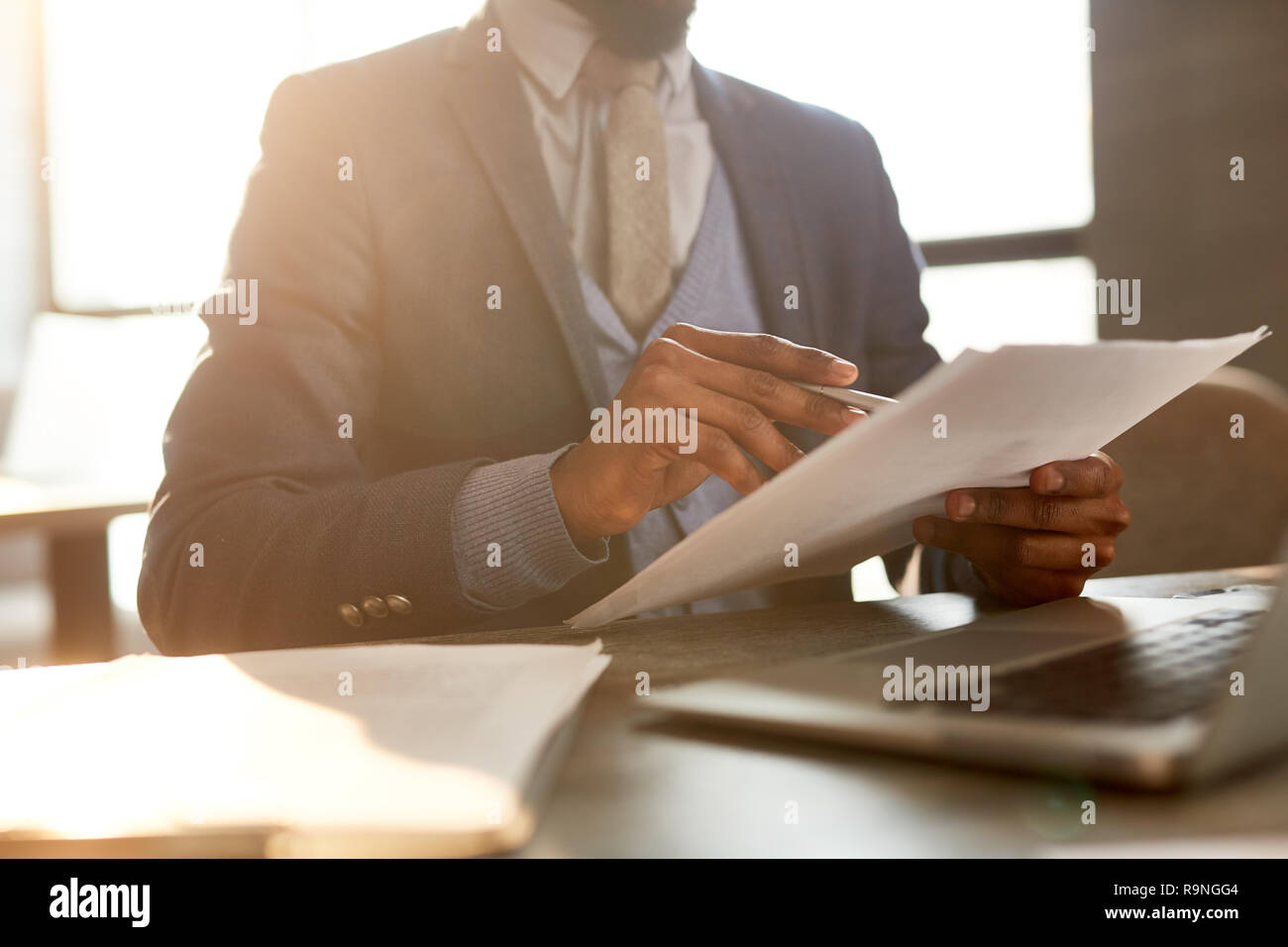 Working with papers Stock Photo - Alamy