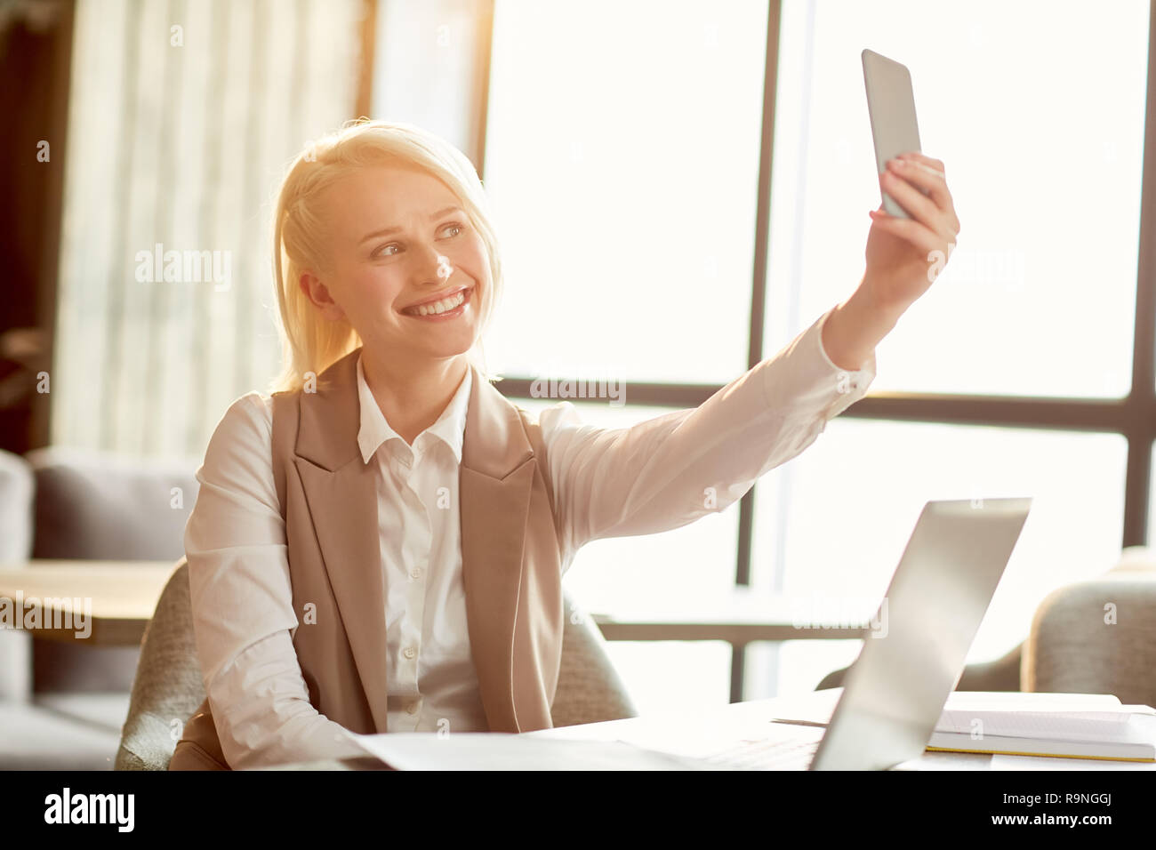 Selfie of young manager Stock Photo - Alamy