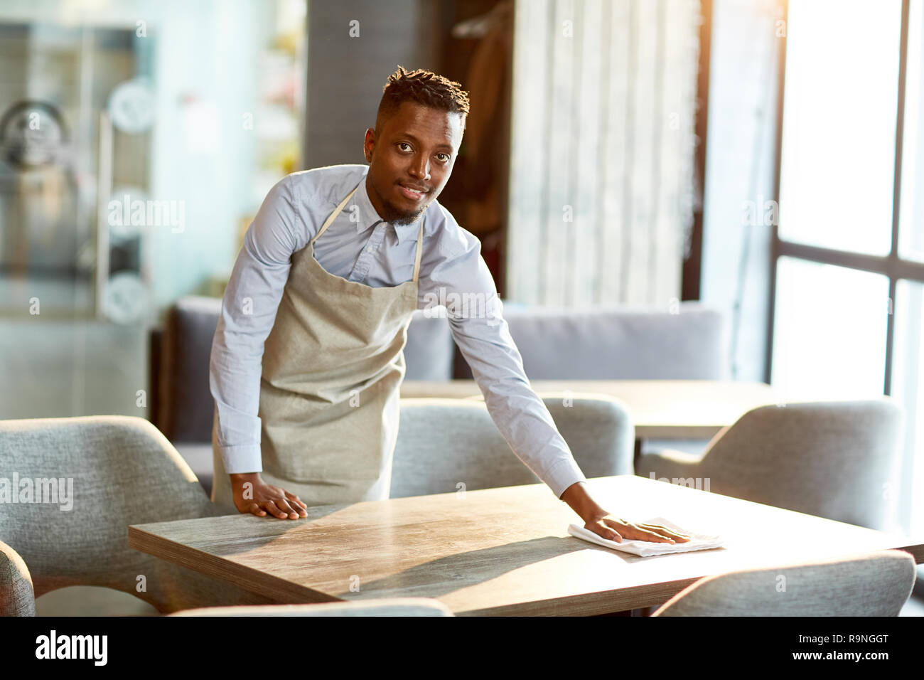 Waiter at work Stock Photo - Alamy