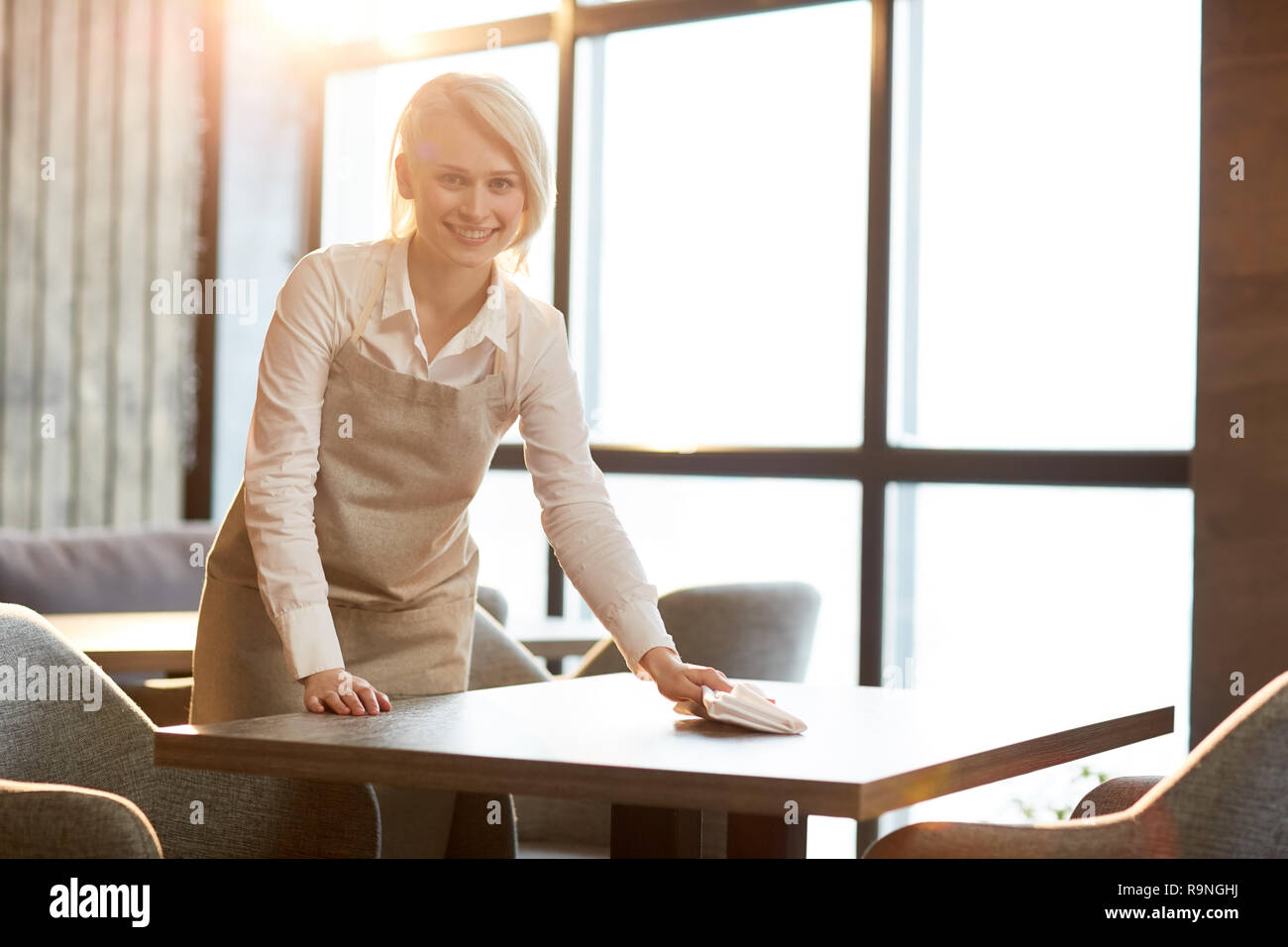 Woman lunch time cleaning hi-res stock photography and images - Alamy