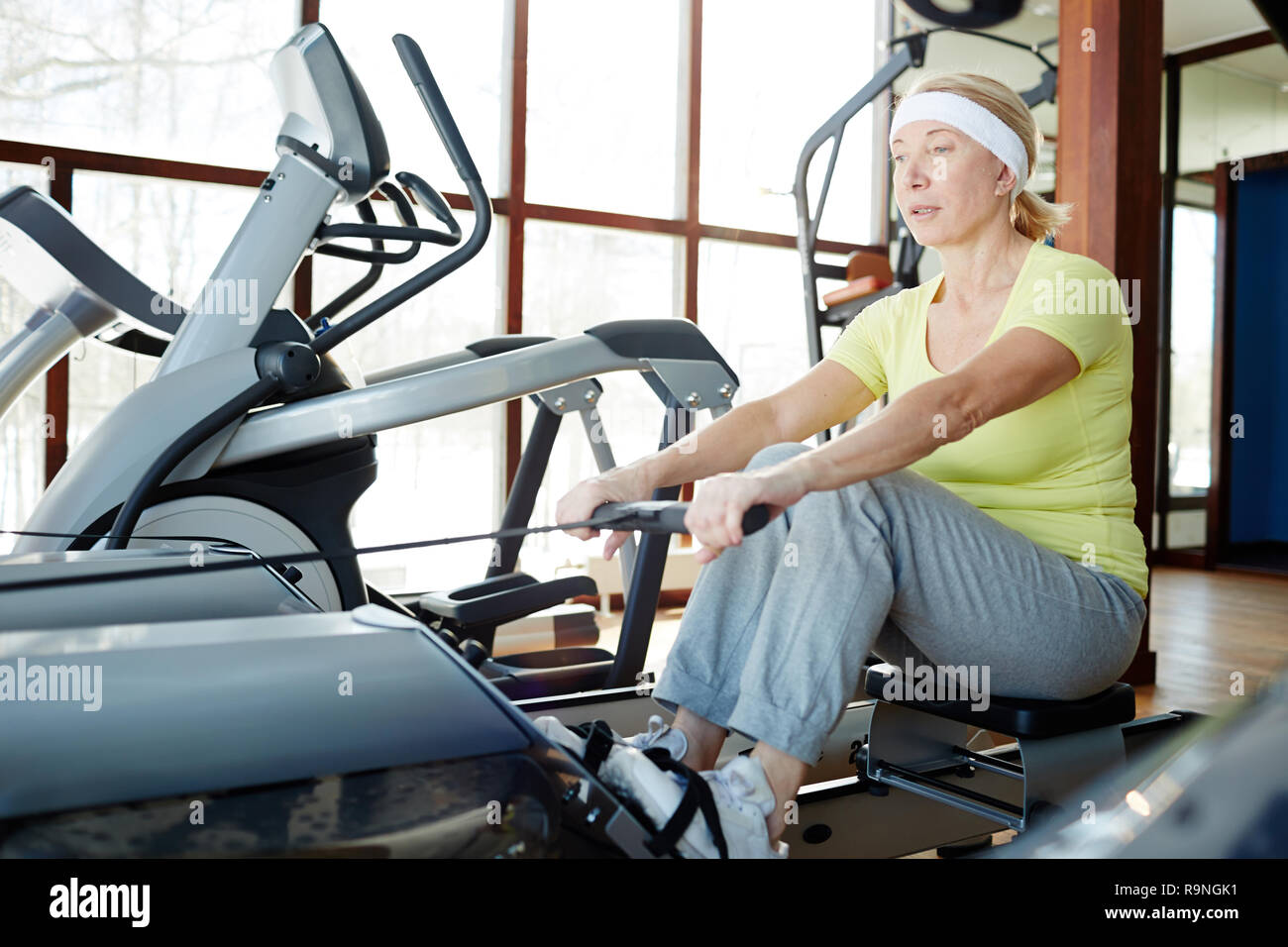 Woman, rowing, gym hi-res stock photography and images - Alamy