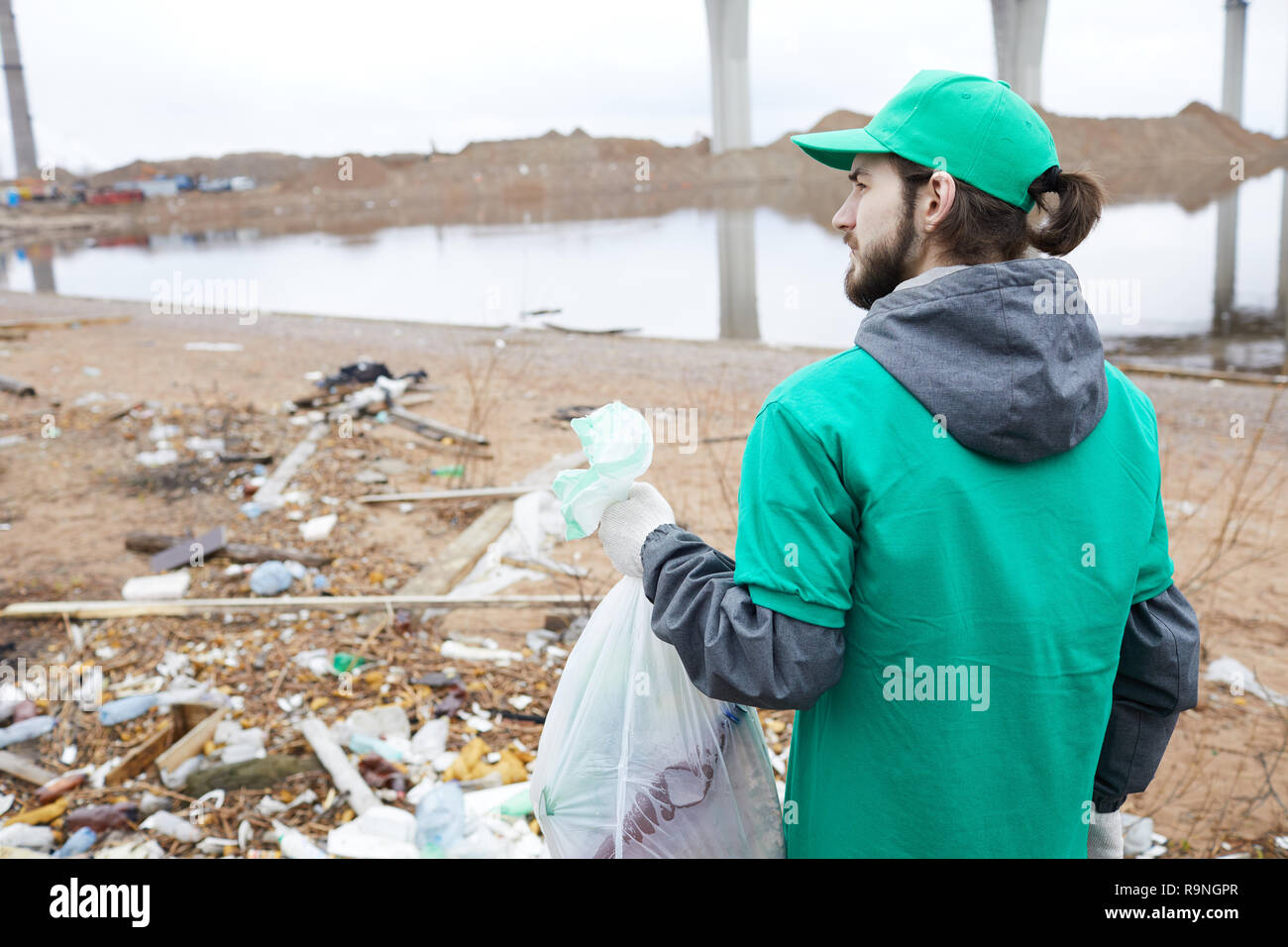 Cleaning river bank Stock Photo - Alamy