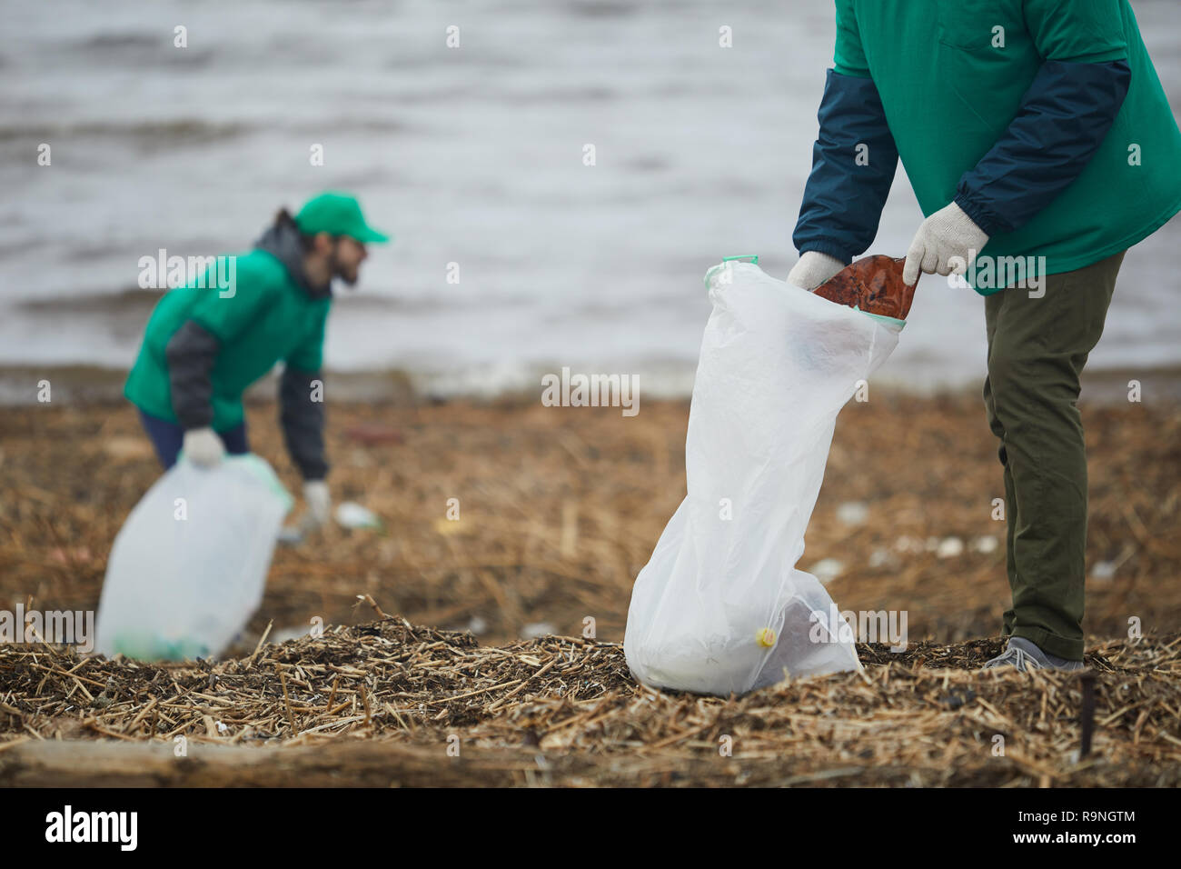 Cleaning river bank territory Stock Photo - Alamy