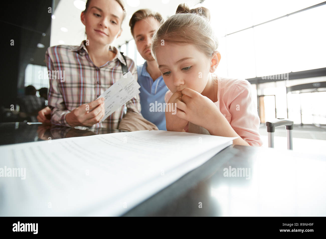 Girl check in airport hi-res stock photography and images - Alamy