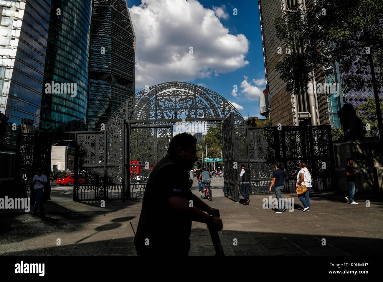 Chapultepec forest grilles and Reform buildings. Urban park in the city ...