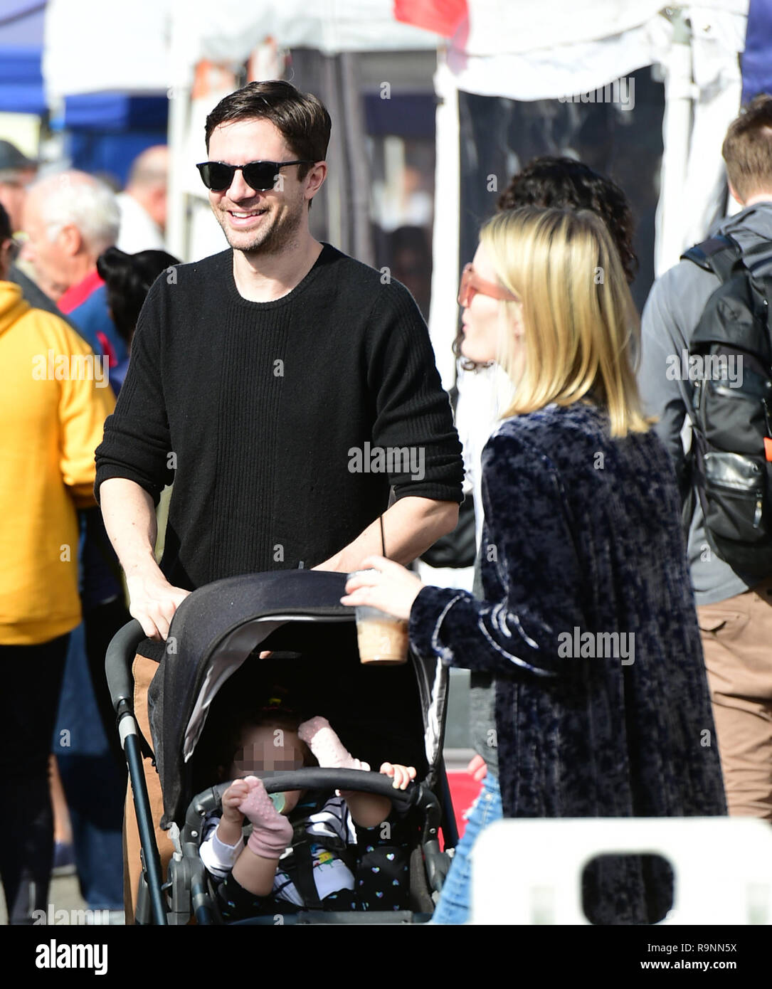 Topher Grace goes to the Farmers Market with his wife and their baby ...