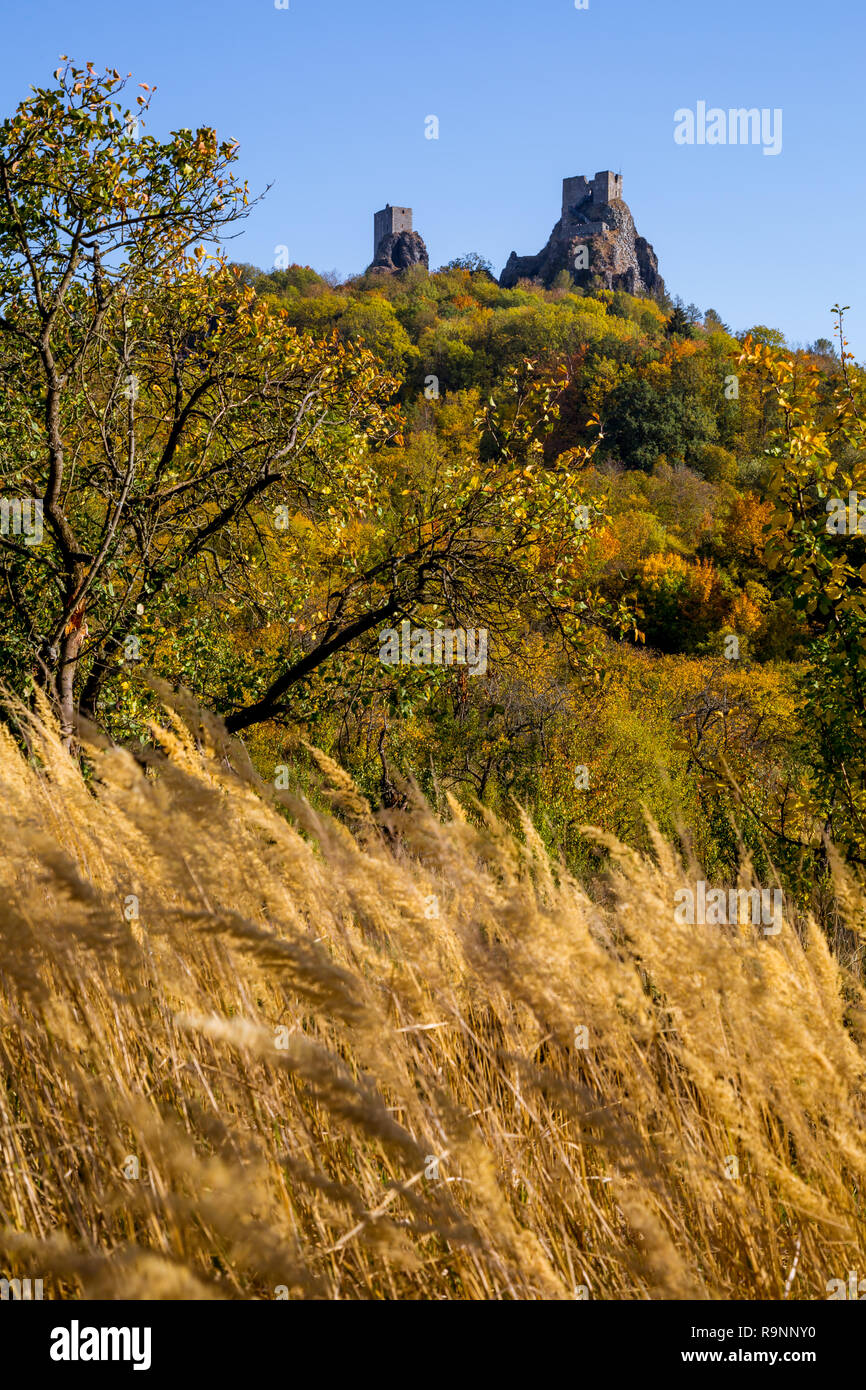 Autumn landscape in Bohemia dominating the ruins of a medieval castle ...