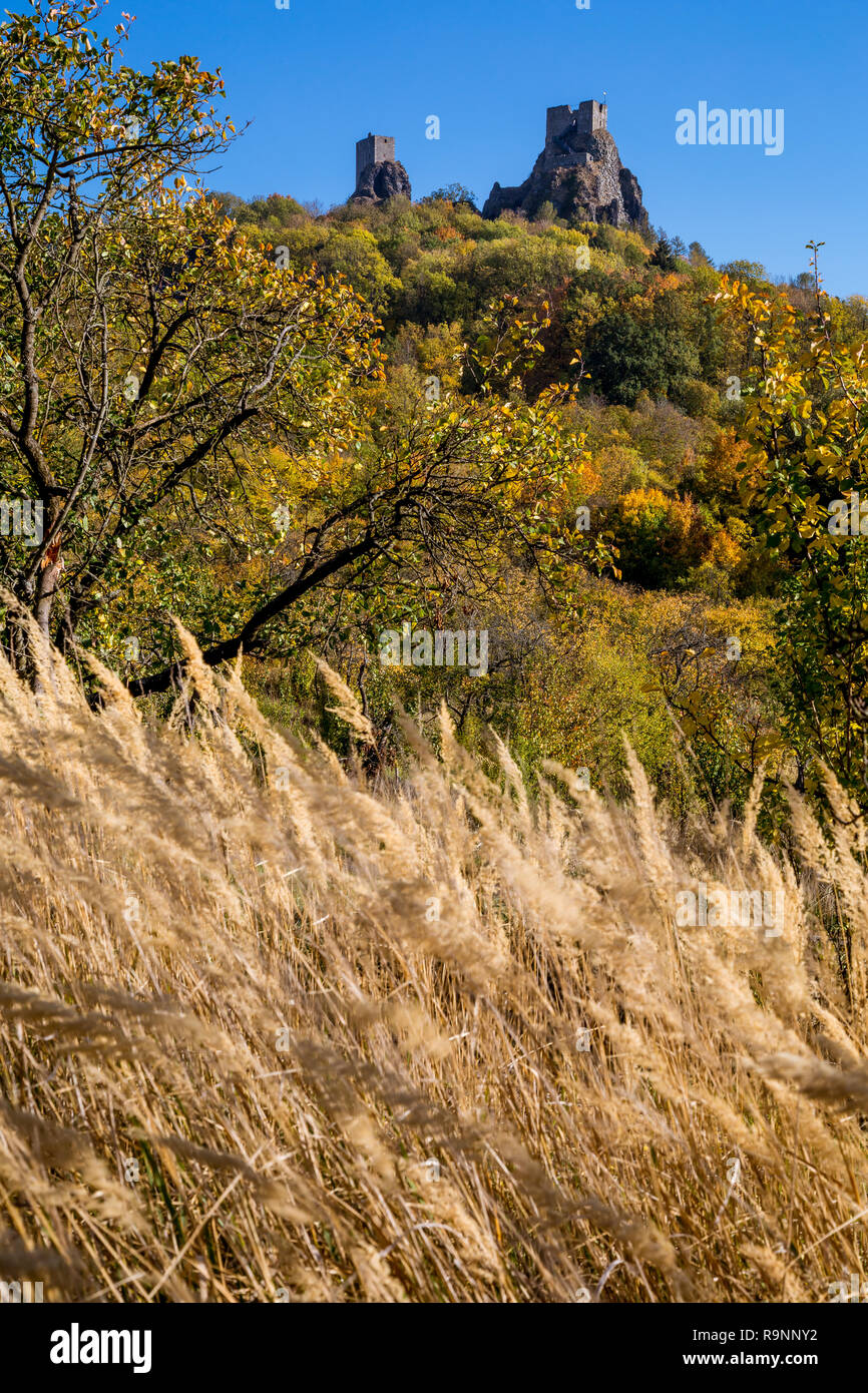 Autumn landscape in Bohemia dominating the ruins of a medieval castle ...