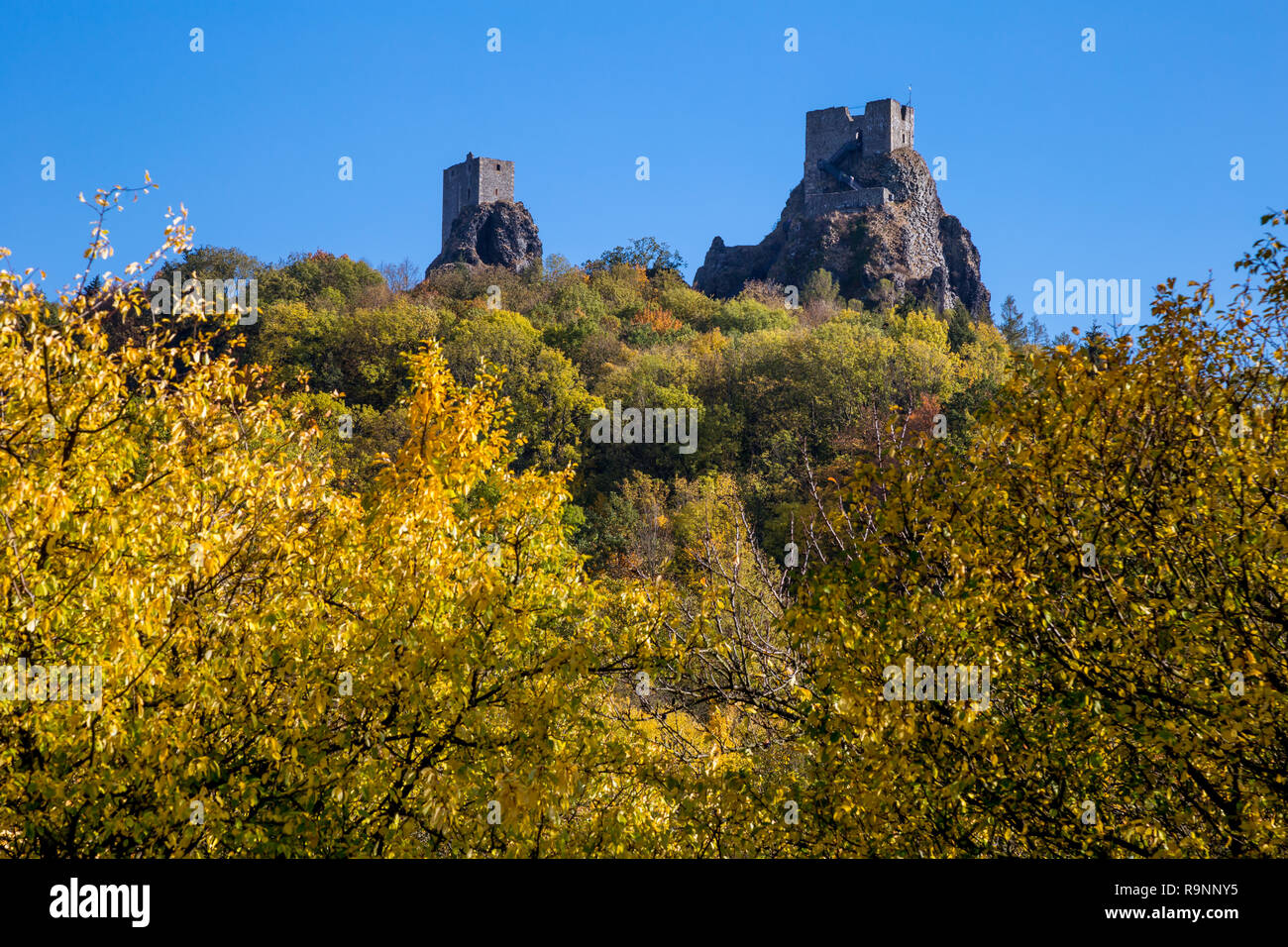 Autumn landscape in Bohemia dominating the ruins of a medieval castle ...