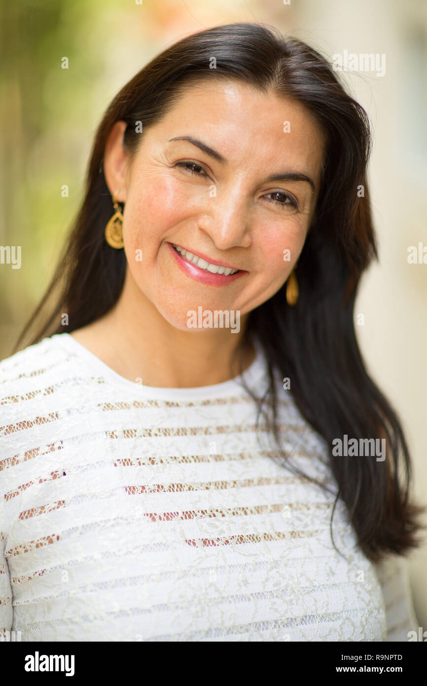 Mature hispanic business woman hi-res stock photography and images - Alamy