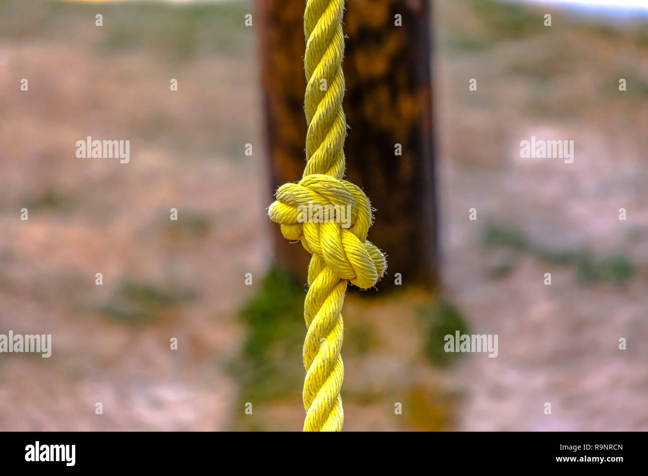 Rope on playground made for climbing vertically Stock Photo - Alamy