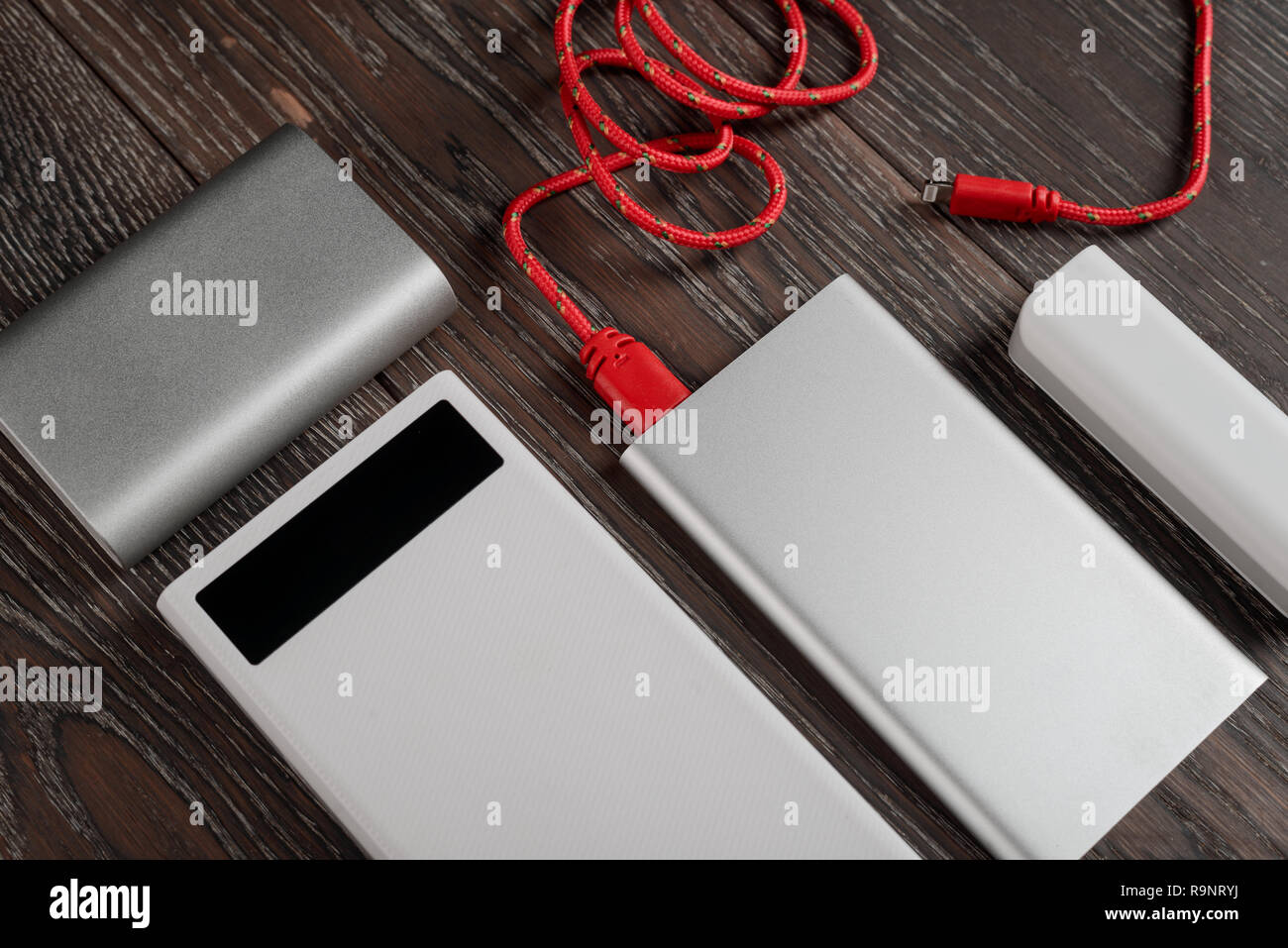 Four different power banks Stock Photo - Alamy
