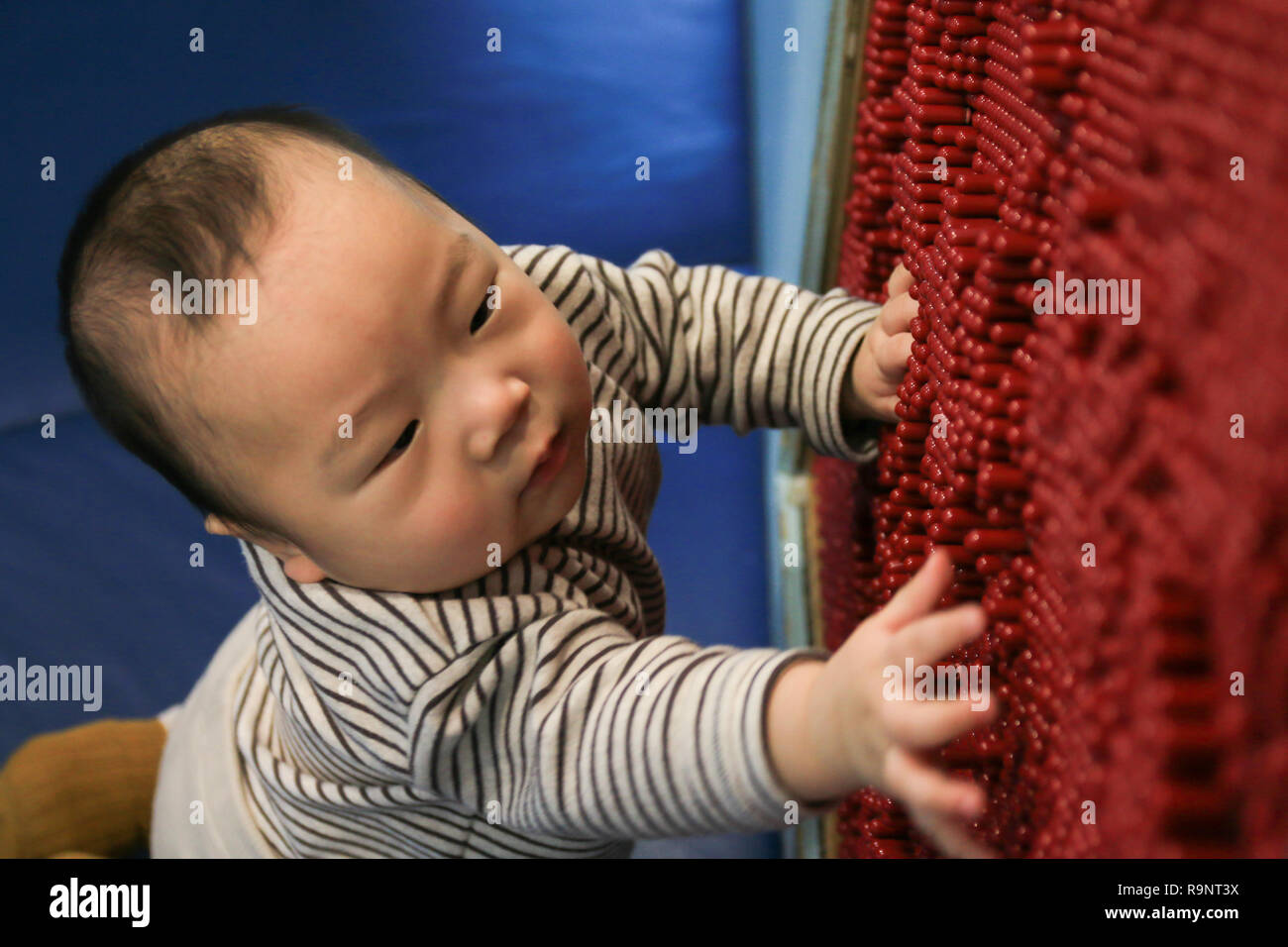 10 months adorable Asian baby development Stock Photo - Alamy