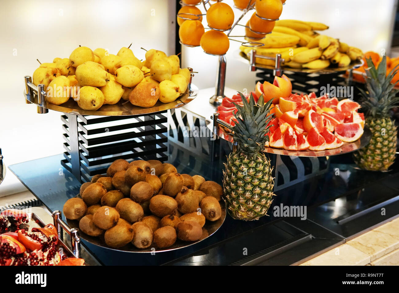 fresh fruit plates on the table lay a restaurant kitchen Stock Photo ...