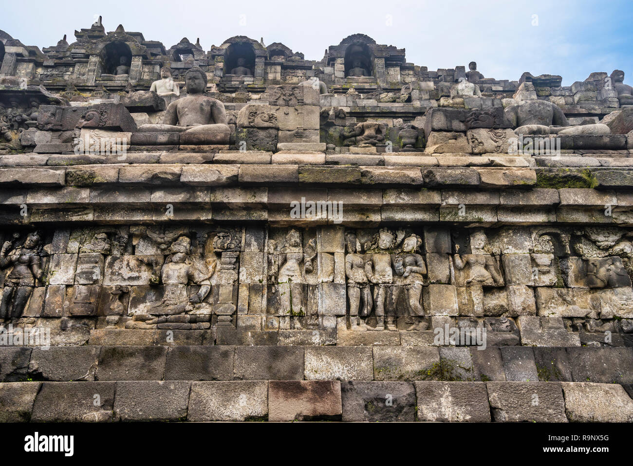 bas relief panel on a balustrade of 9th century Borobudur Buddhist ...
