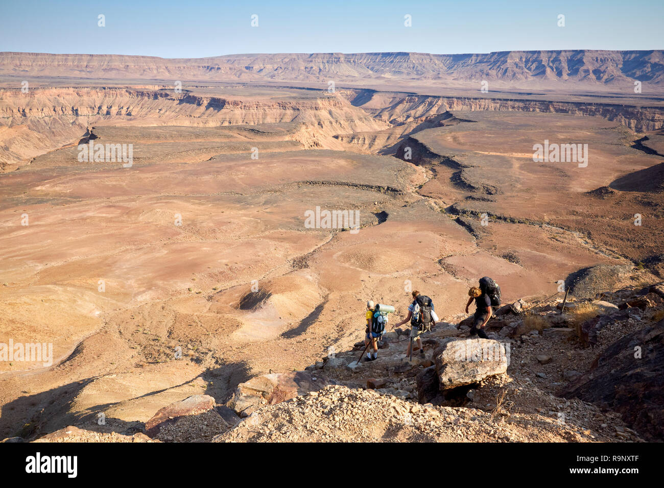 Hikers asdnding into a Fish River Canyon Hiking trekking hikers ...