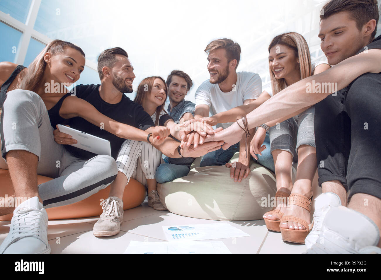 group of young men folded their hands together Stock Photo - Alamy