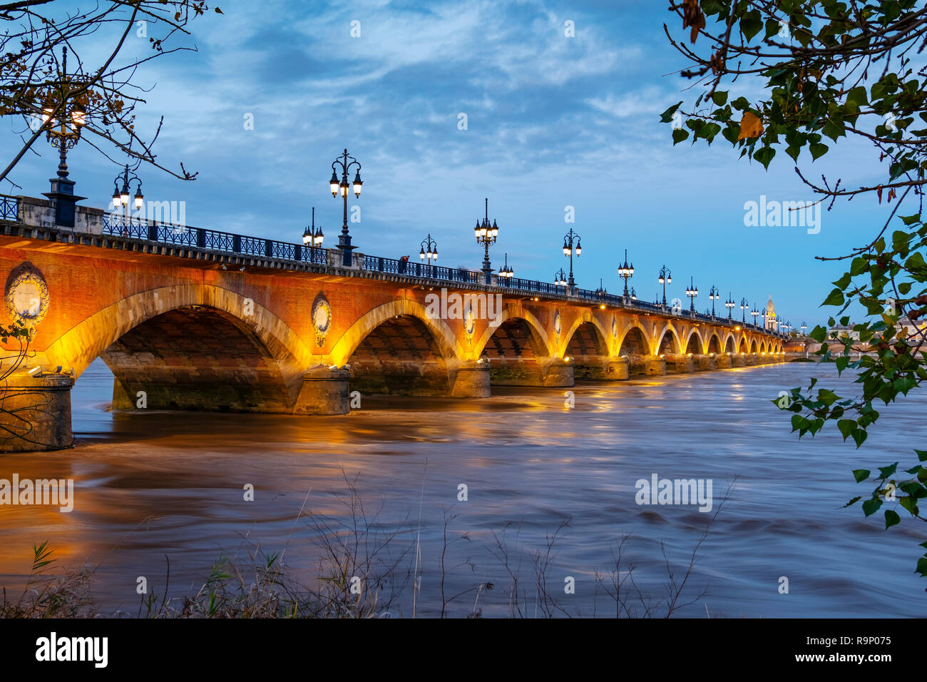 Pont de Pierre at dusk. Stone Bridge & Garonne River. Bordeaux, Gironde ...