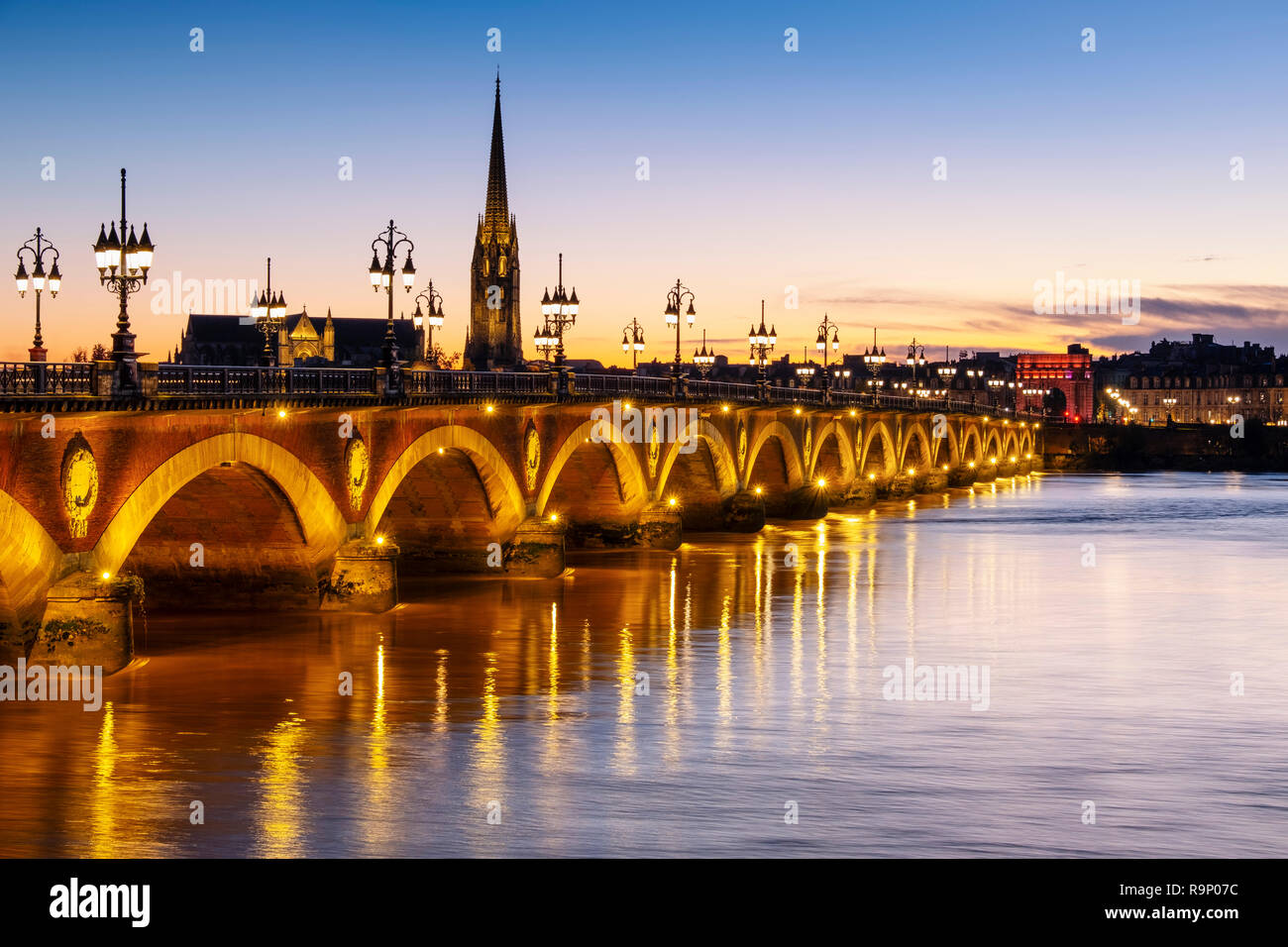 Pont de Pierre at dusk. Stone Bridge & Garonne River. Bordeaux, Gironde ...