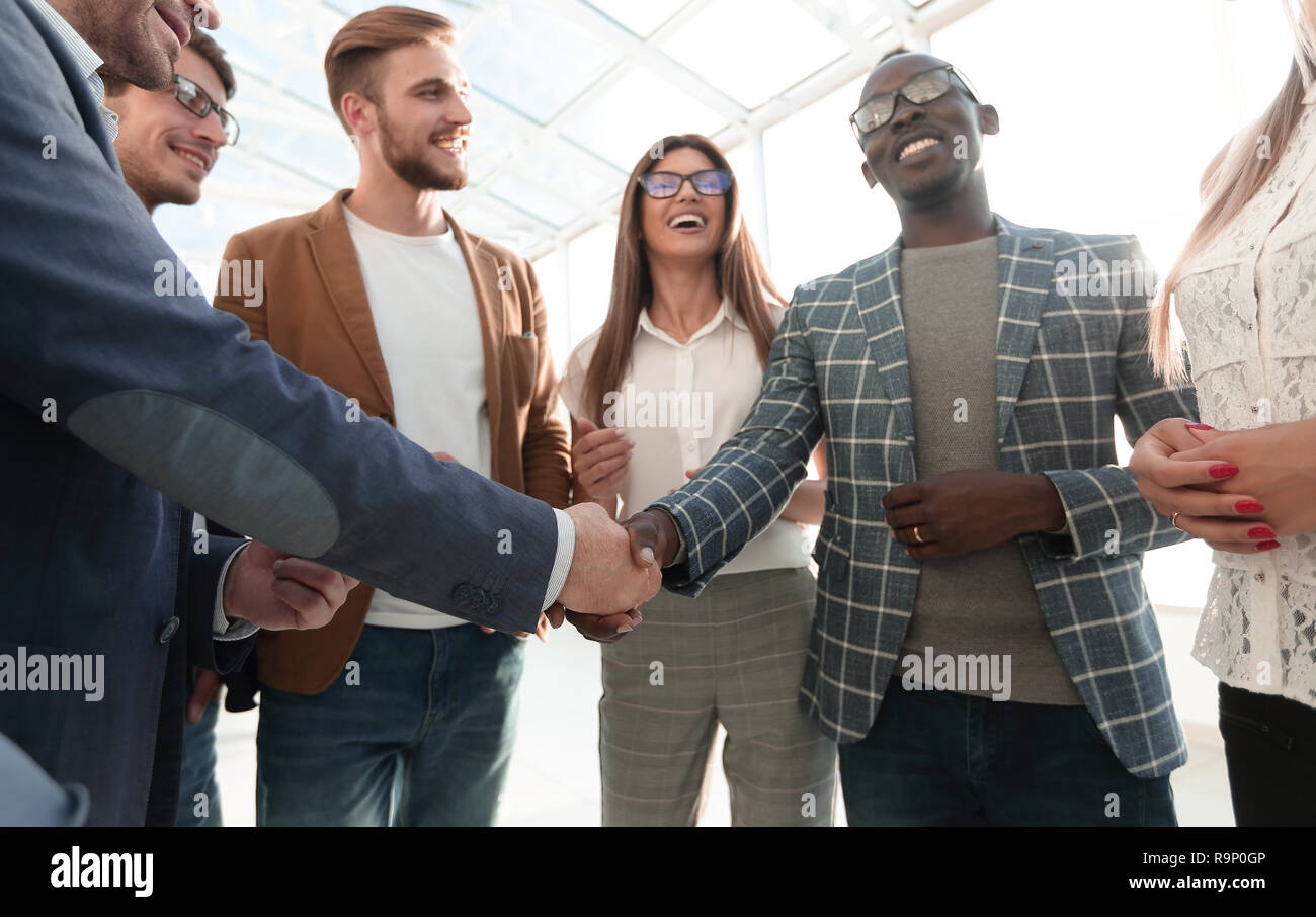stylized image. handshake of international business partners Stock Photo - Alamy