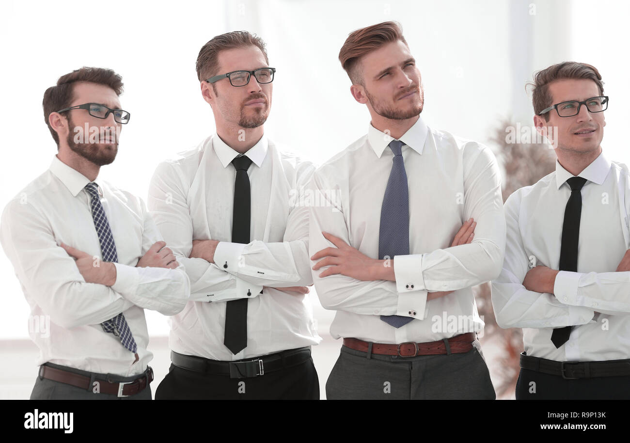 professional business team standing in the office Stock Photo - Alamy