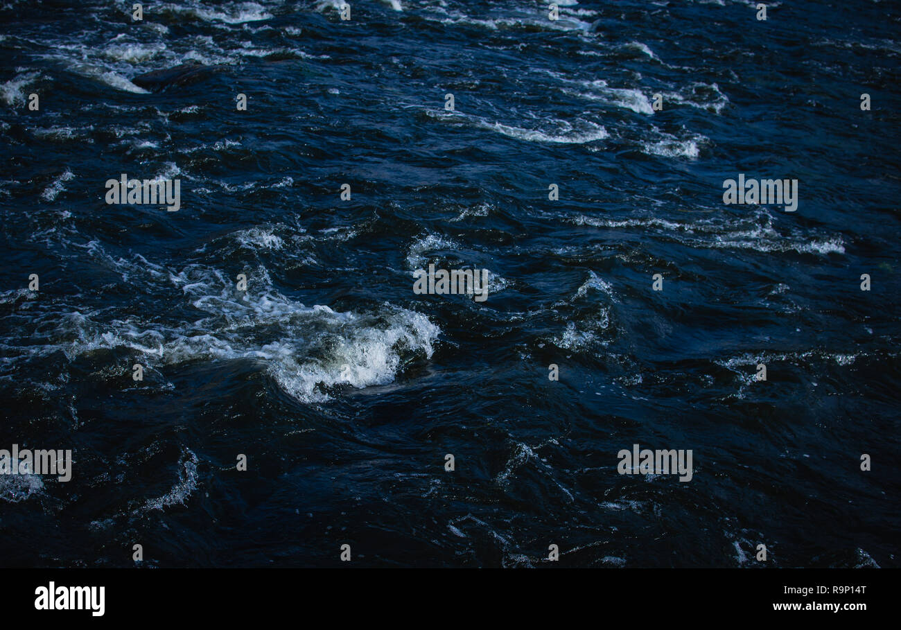 The waters of the turbulent river Stock Photo - Alamy