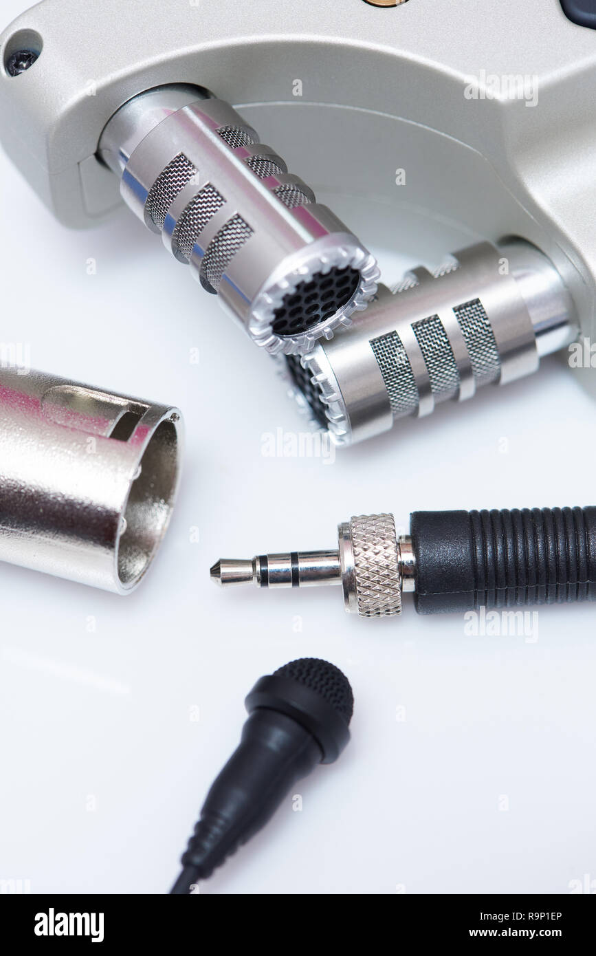 Microphone and audio jack on white background close up view Stock Photo ...