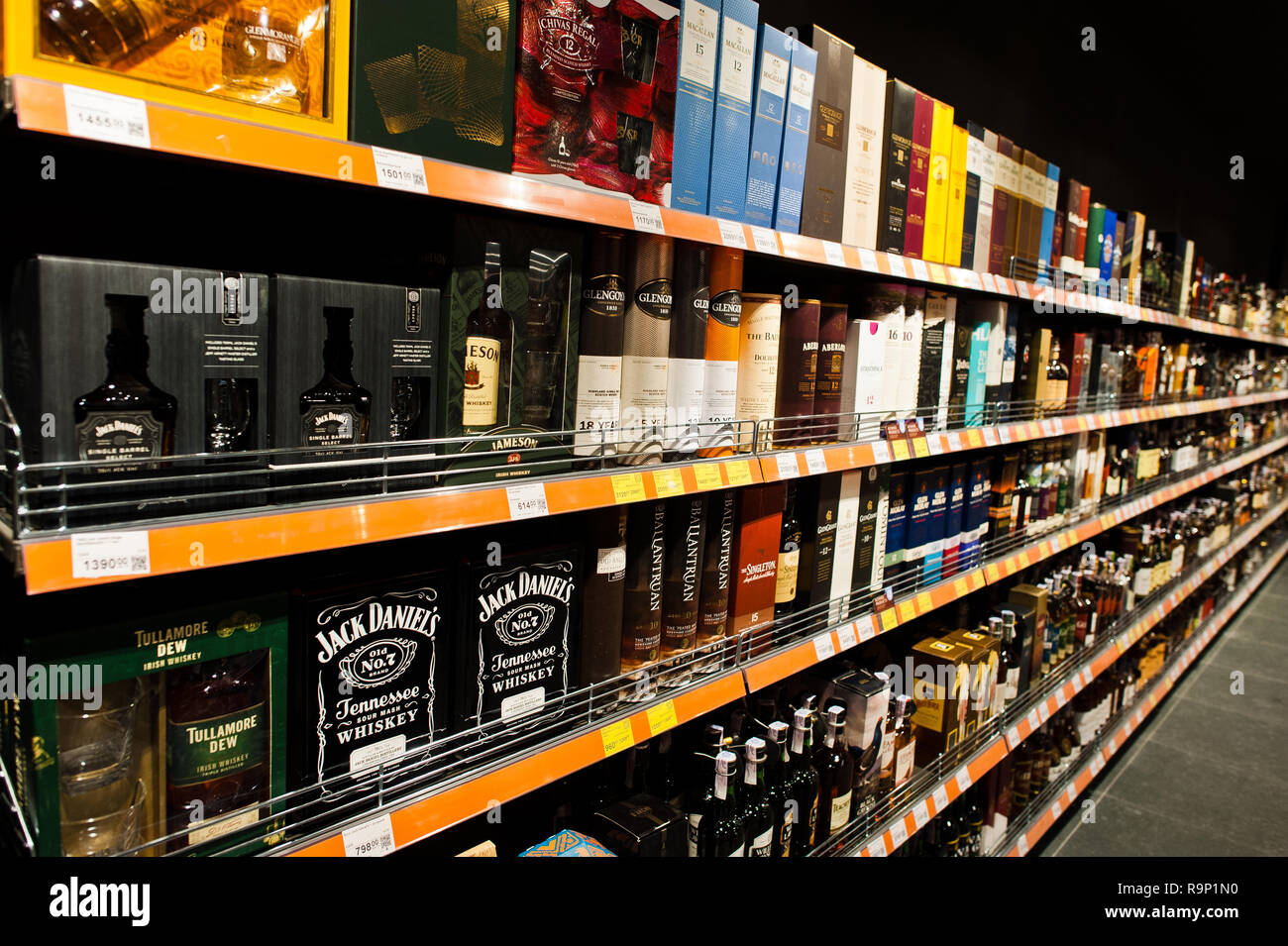 Bottles of alcohol on sale in a supermarket hi-res stock photography ...