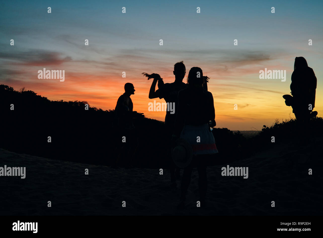 Playing in the sunset hi-res stock photography and images - Alamy