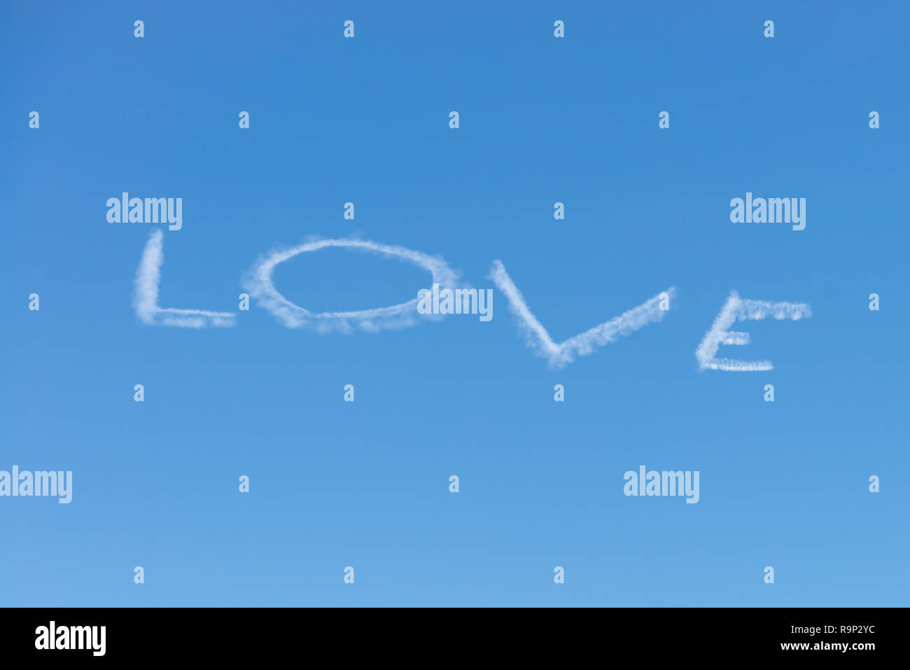 Aircraft in the sky with love text hi-res stock photography and images ...