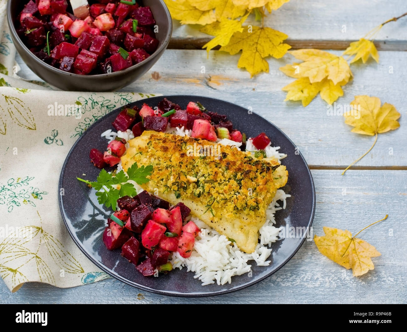 the baked cod with stewed vegetables and rice Stock Photo - Alamy