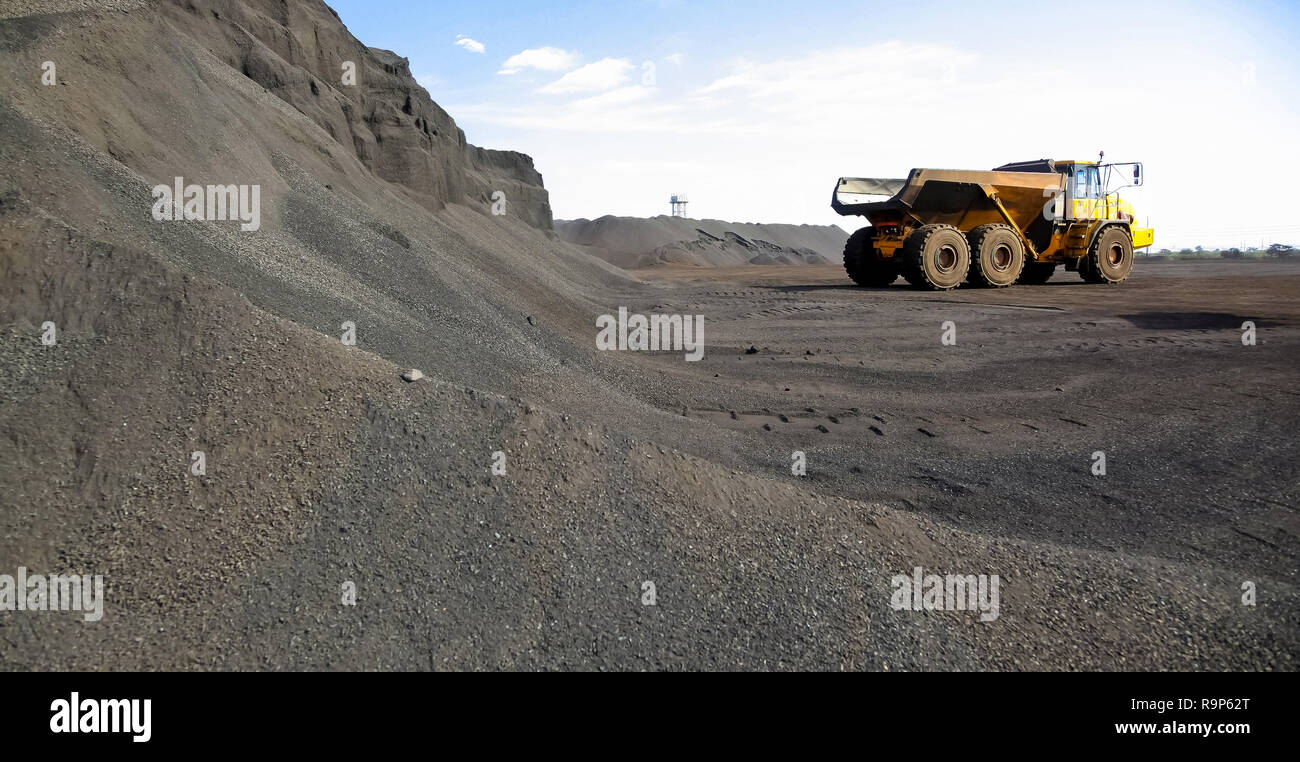Mining Dump Truck transporting Manganese for processing, Manganese ...