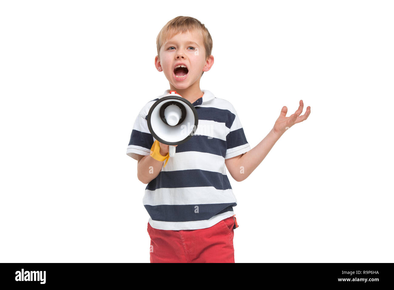 Little cute kid baby boy holding in hand and speaking in electronic ...