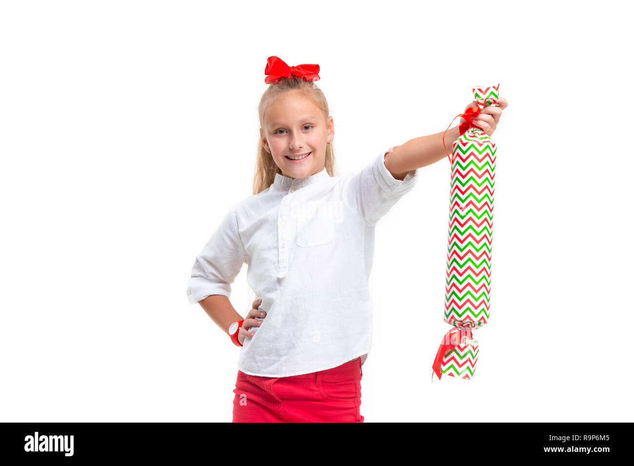 Full length portrait of cute little kid girl in stylish clothes looking ...