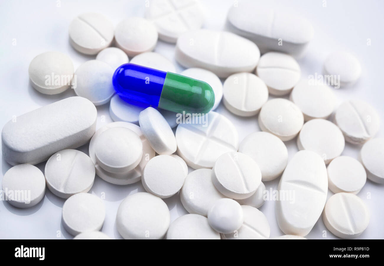 Capsule blue and green on some tablets are white, conceptual image ...