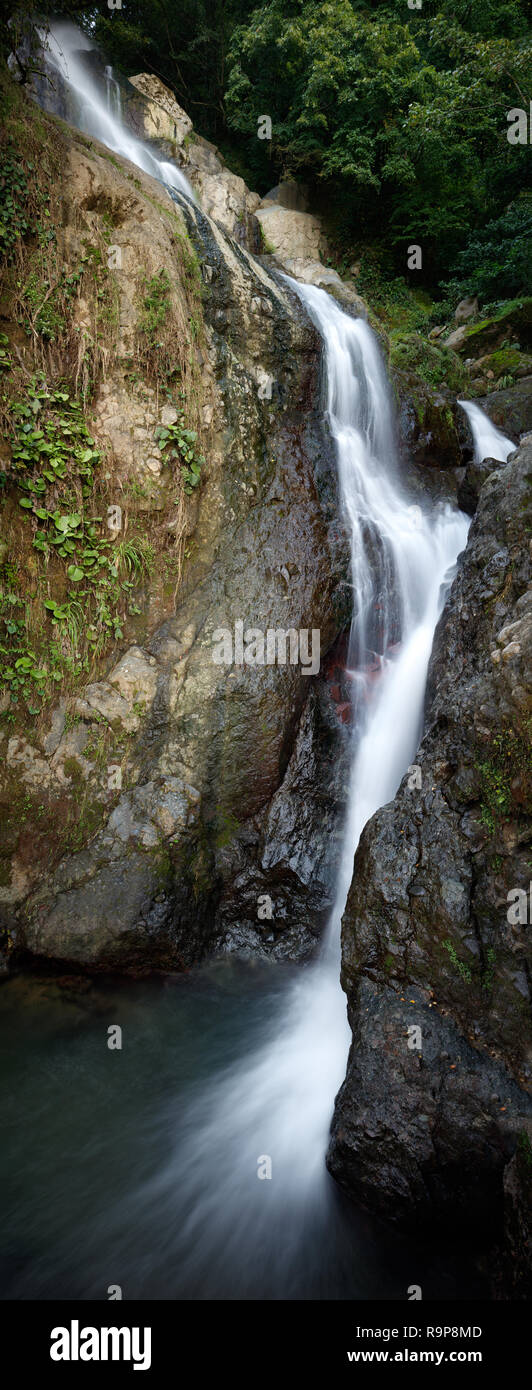 Mountain waterfall vertical panorama Stock Photo - Alamy
