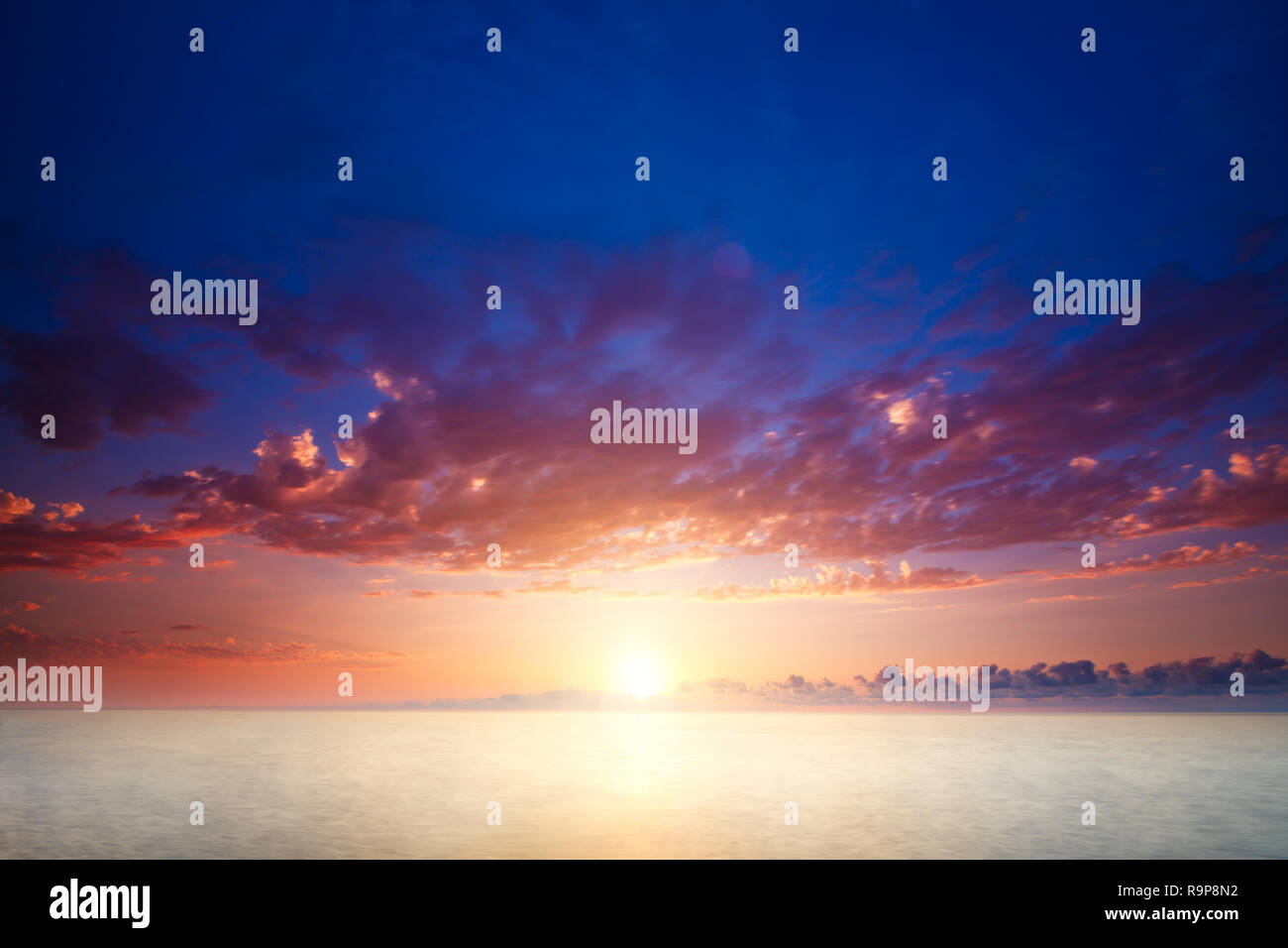 Beautiful sunset over the sea Stock Photo - Alamy